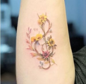 20 Interesting Music Tattoo Ideas You'll Love | HeadphonesProReview