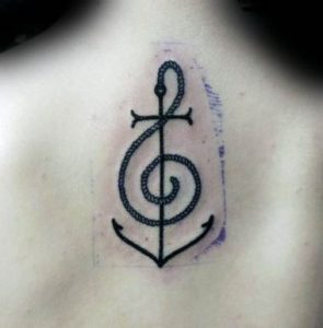 20 Interesting Music Tattoo Ideas You'll Love | HeadphonesProReview